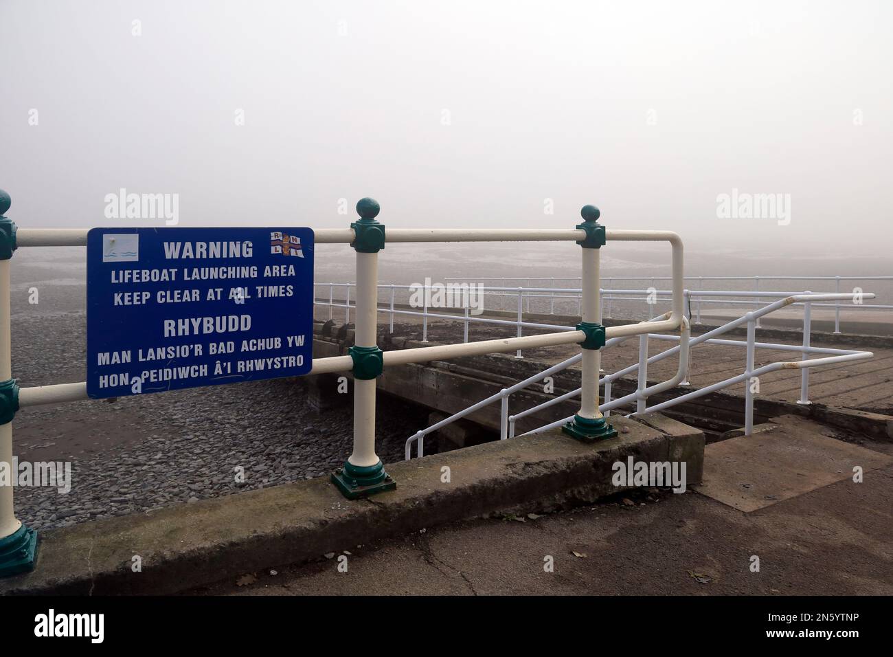 Lifeboat launch slipway and warning sign at Penarth, Vale of Glamorgan ...