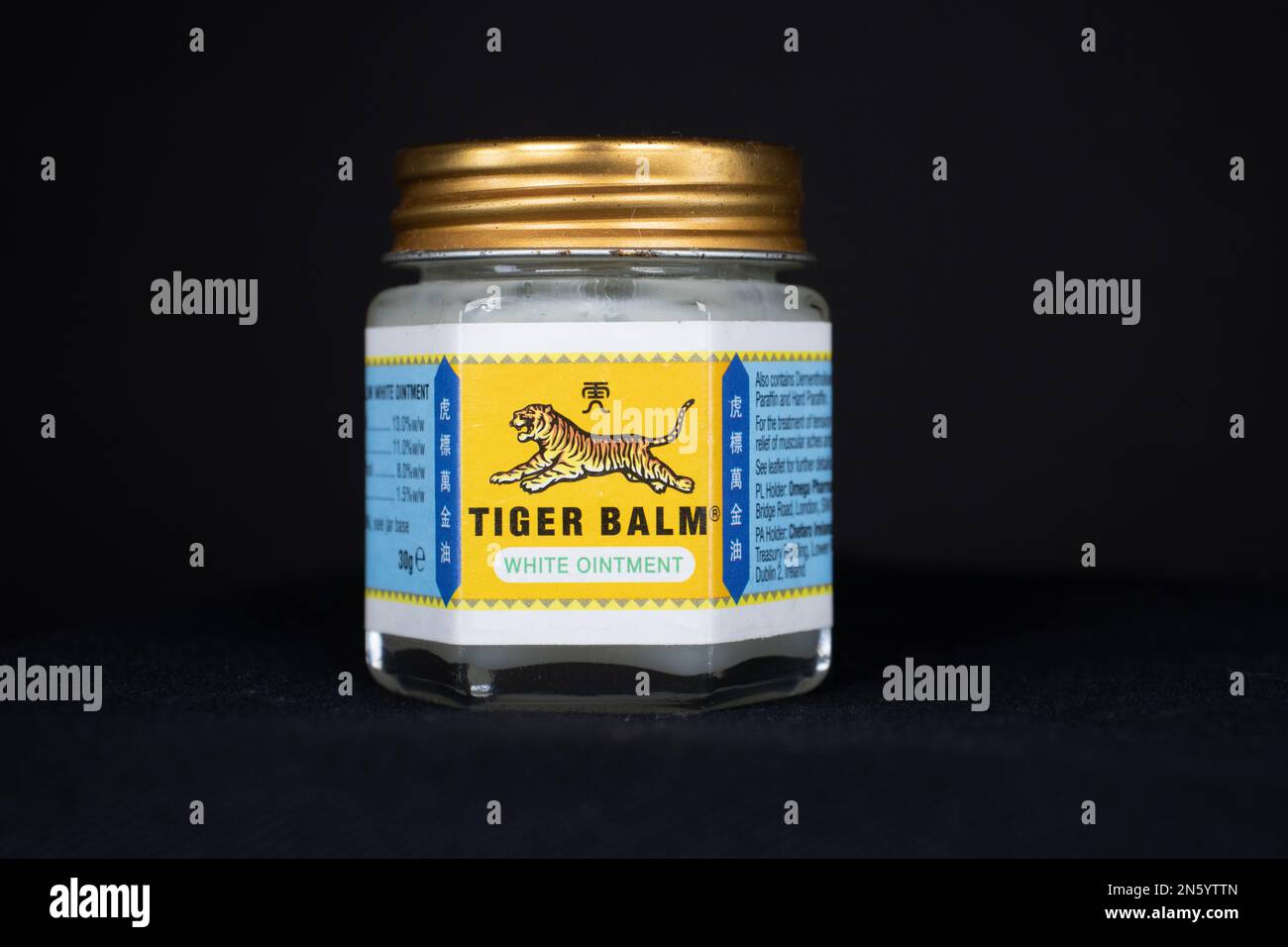 EXETER, DEVON, UK - JANUARY 17, 2023 Tiger Balm analgesic heat rub ...
