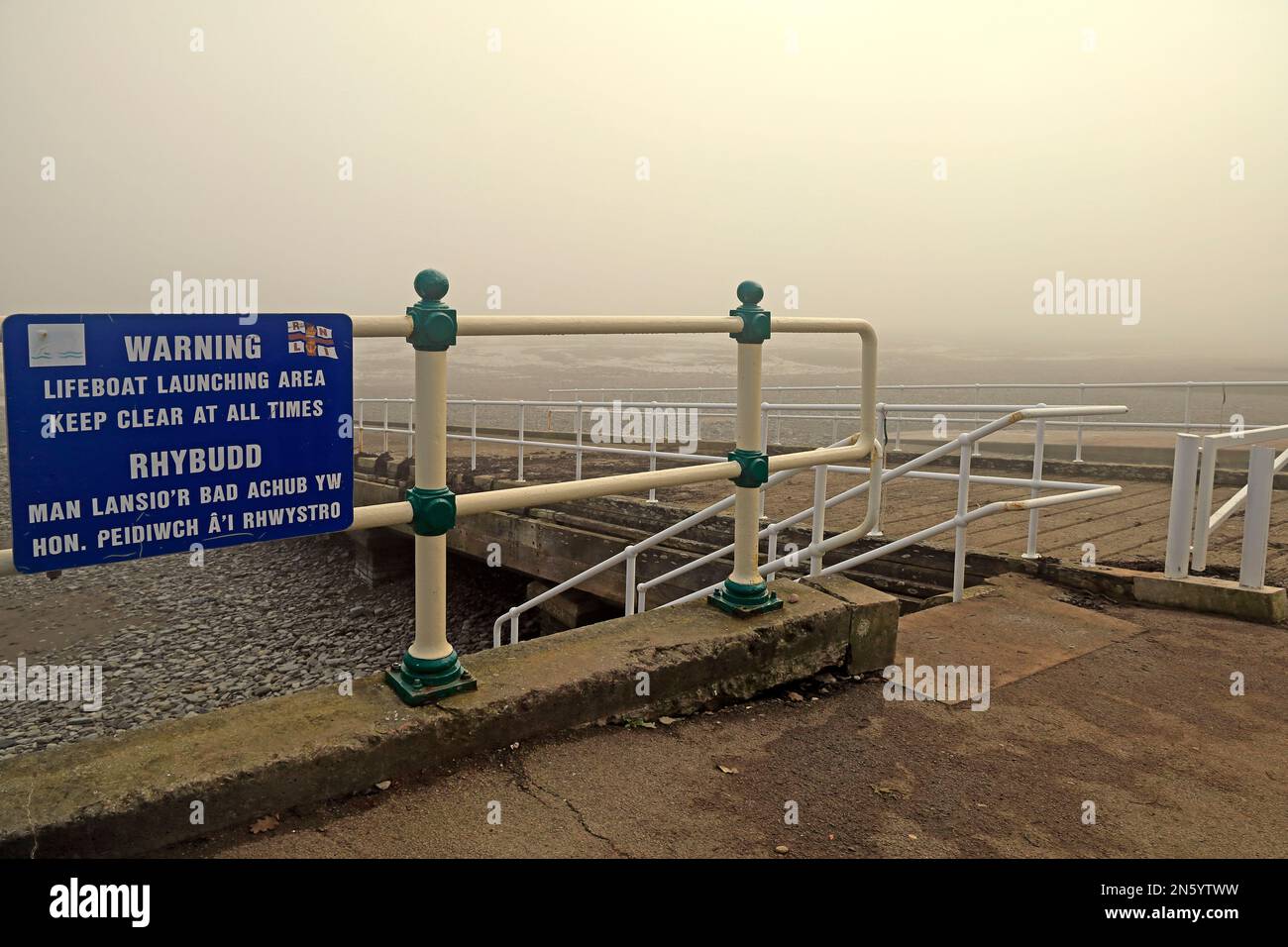 Lifeboat launch slipway and warning sign at Penarth, Vale of Glamorgan ...