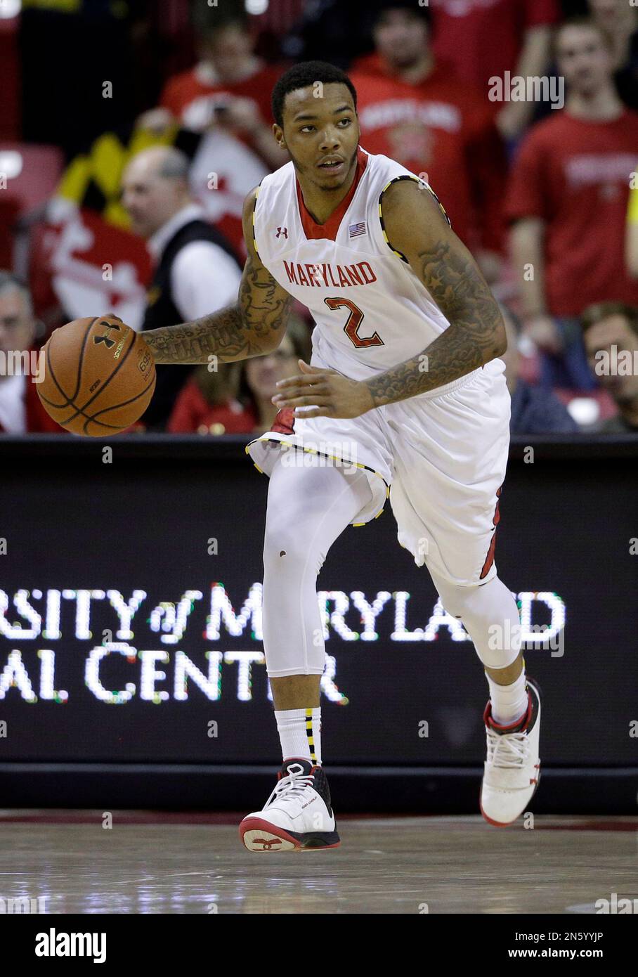 Maryland guard Roddy Peters drives the ball during an NCAA college ...