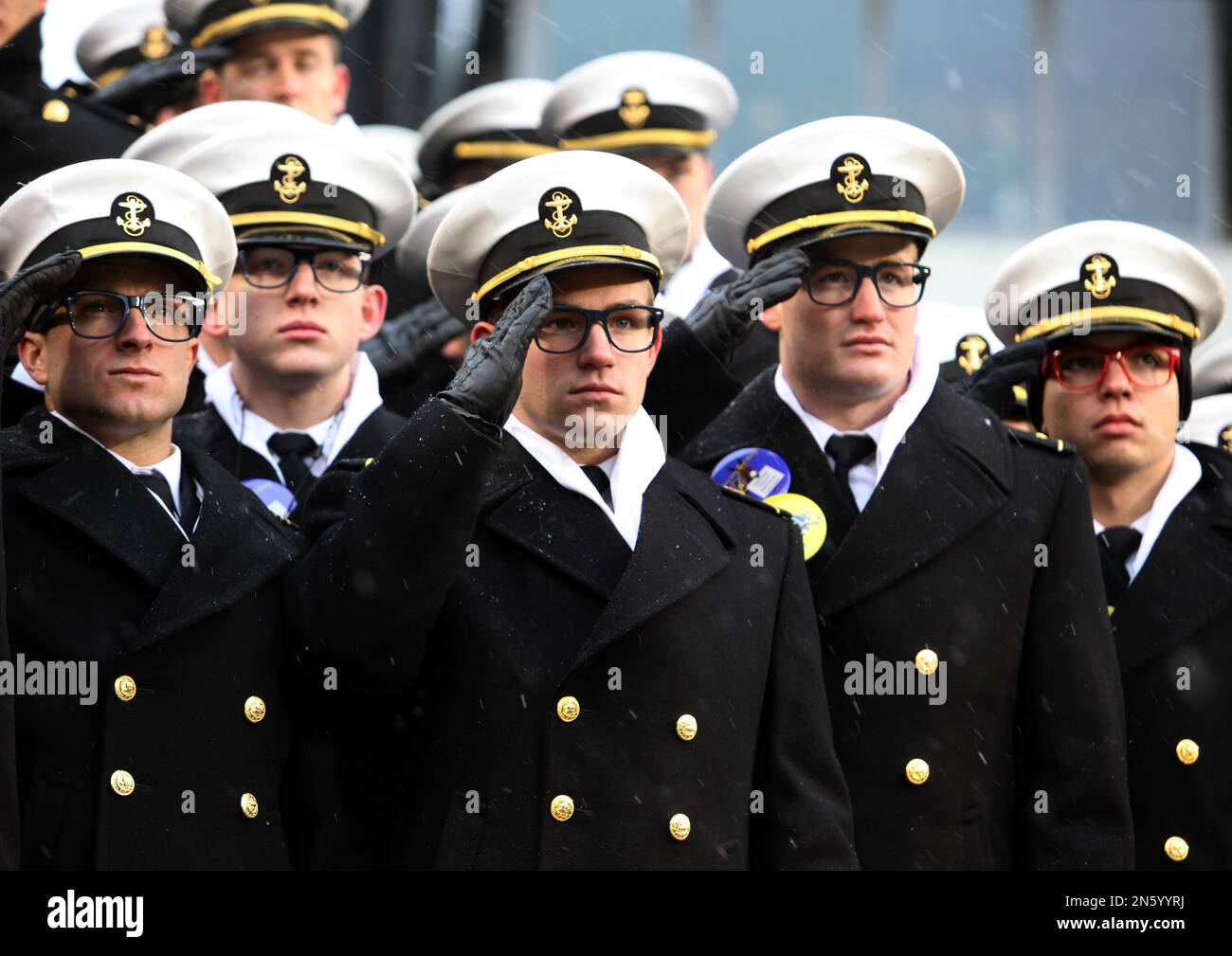 US Navy midshipmen salute during the pre-game ceremony before the start ...