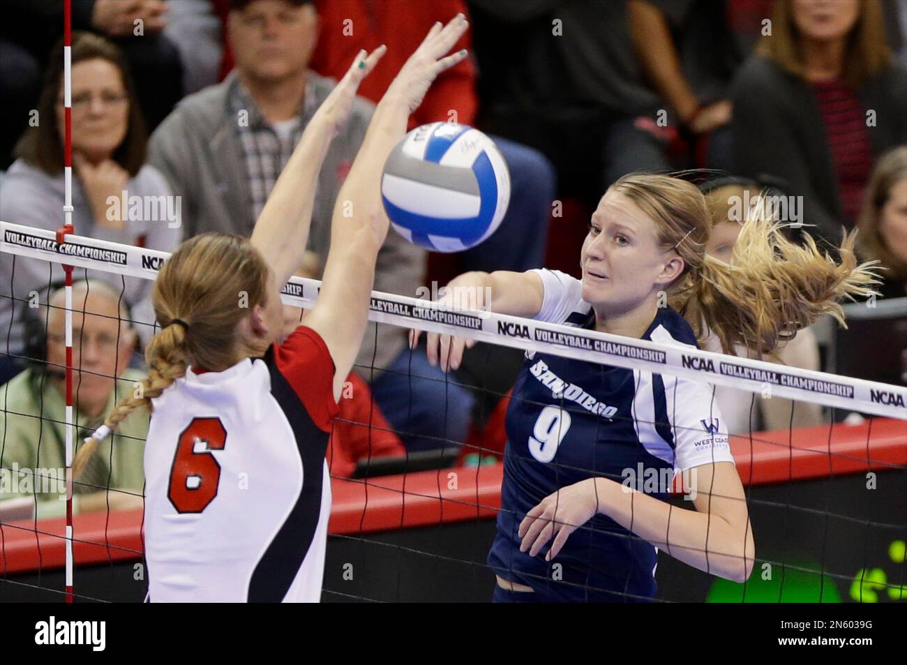 San Diego's Katie Hoekman (9) has a kill against Nebraska's Kadie ...
