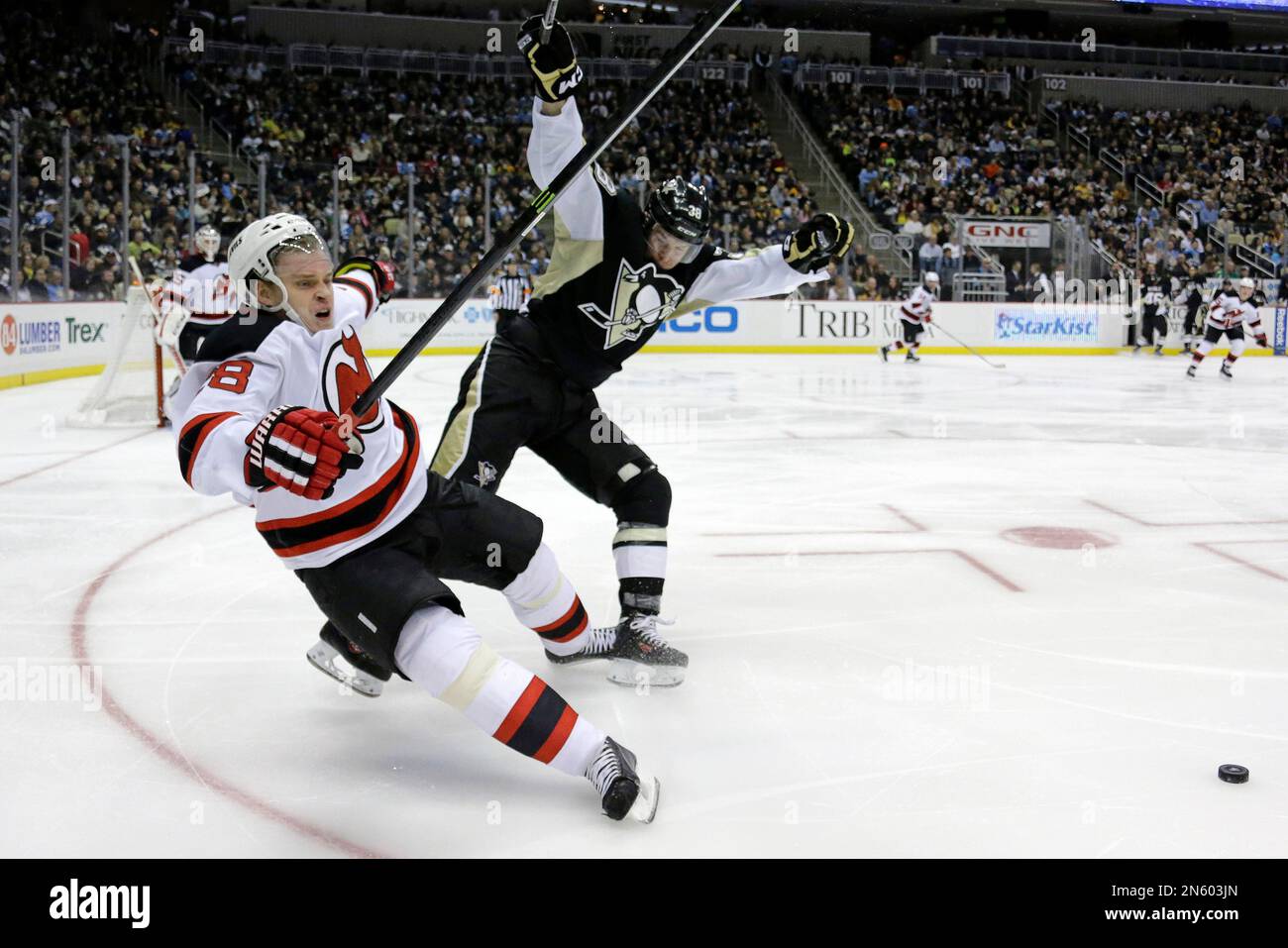Pittsburgh Penguins' Zach Sill (38) collides with New Jersey Devils ...
