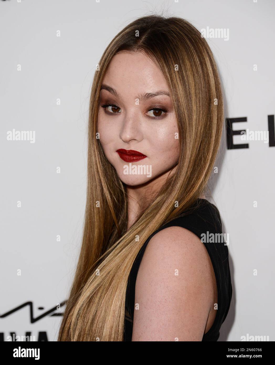 Actress Devon Aoki arrives at the fourth annual amfAR Inspiration Gala ...