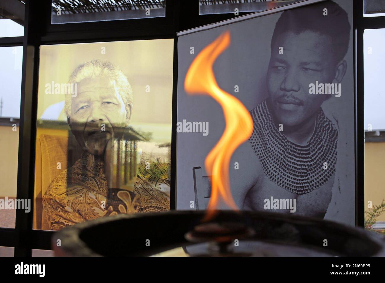 A flame burns in honour of former South African president Nelson ...