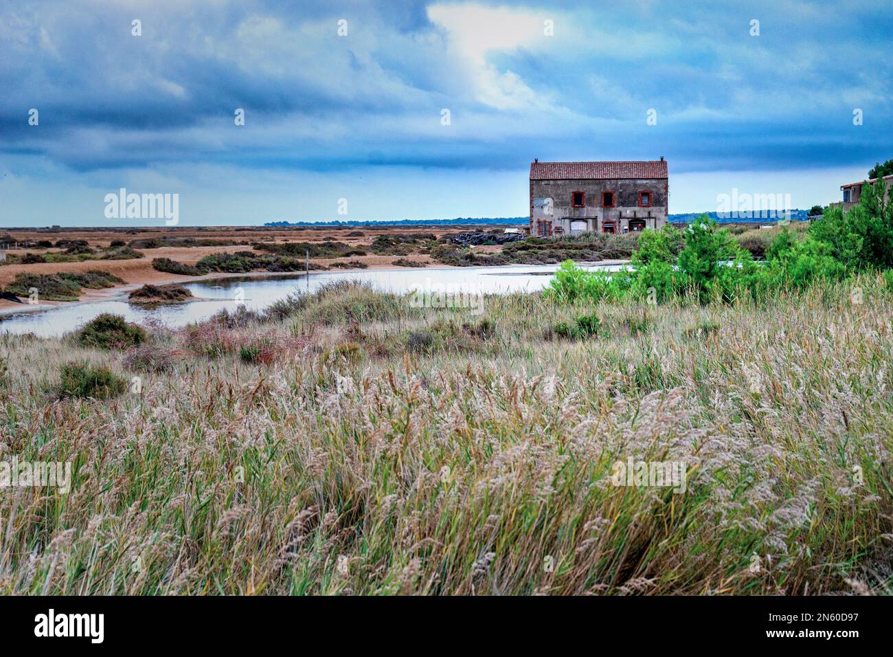 A farmhouse in the wetlands of the Etang de l'Ayrolle near Gruissan on ...