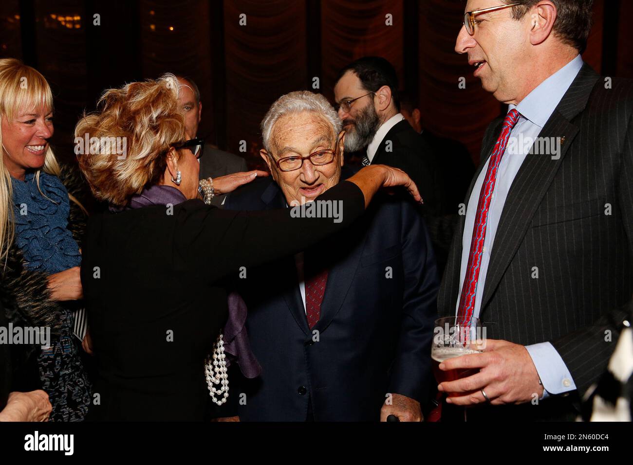 Ophelia Rudin, Henry Kissinger, and Bill Rudin attend the Mr. New York ...