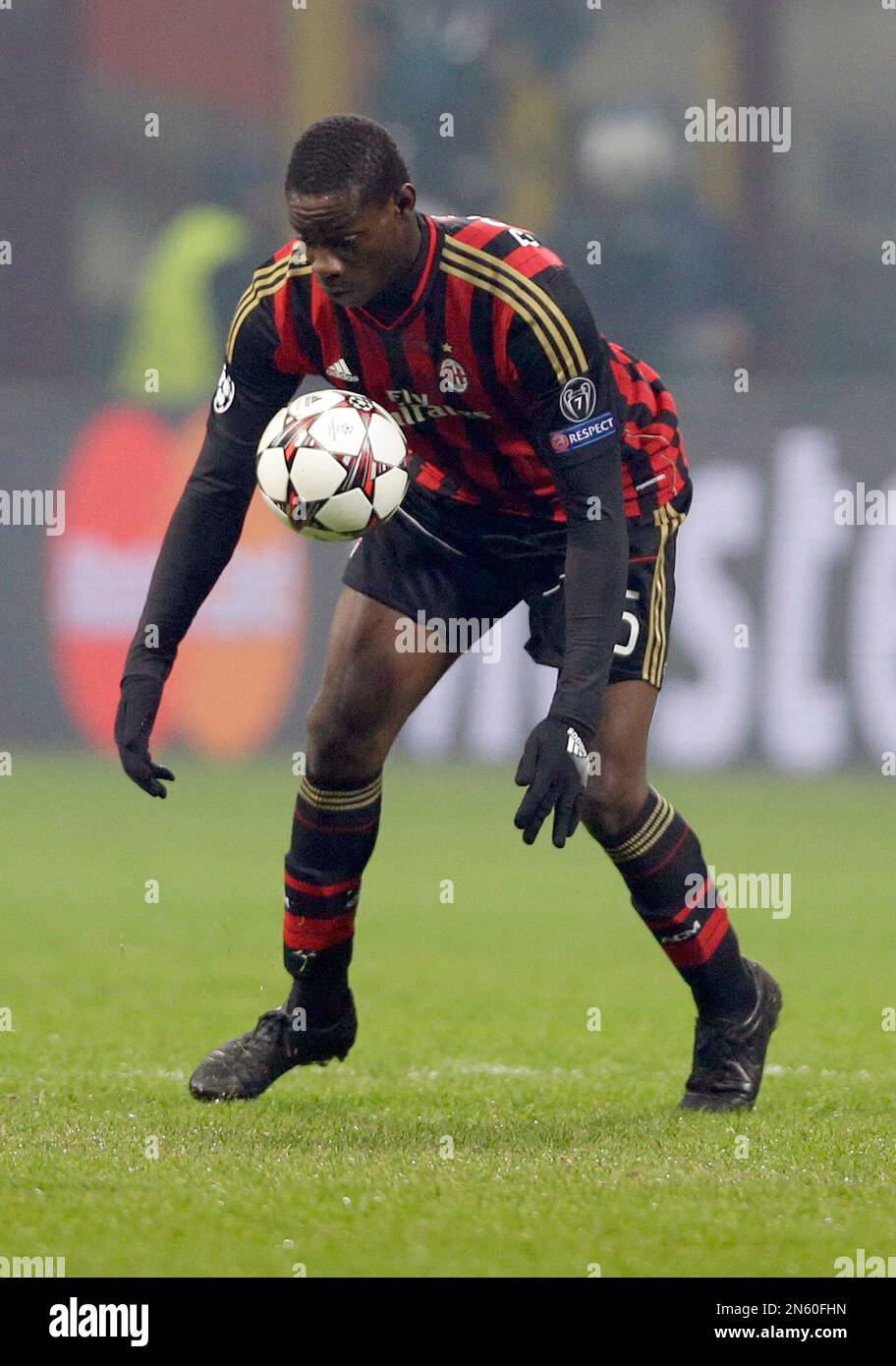 AC Milan forward Mario Balotelli controls the ball during a Champions ...