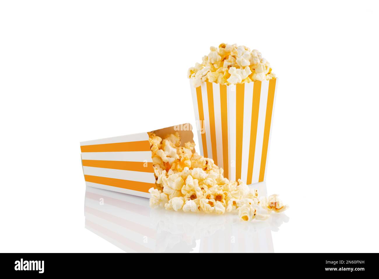 Two yellow white striped carton buckets with tasty cheese popcorn ...