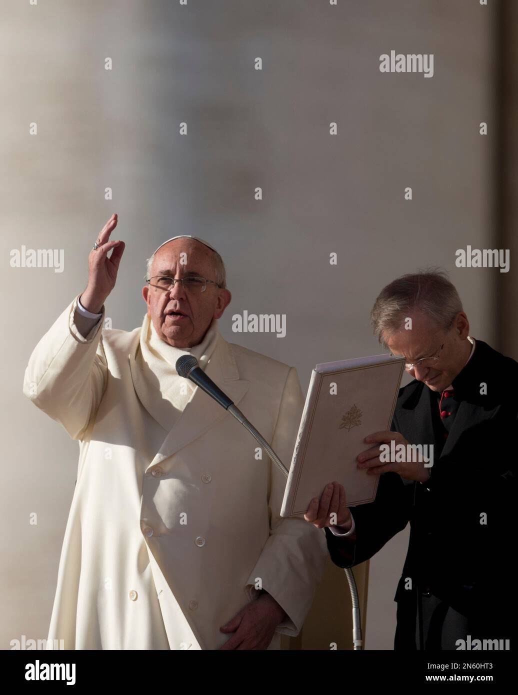Pope Francis delivers his blessing during his weekly general audience ...