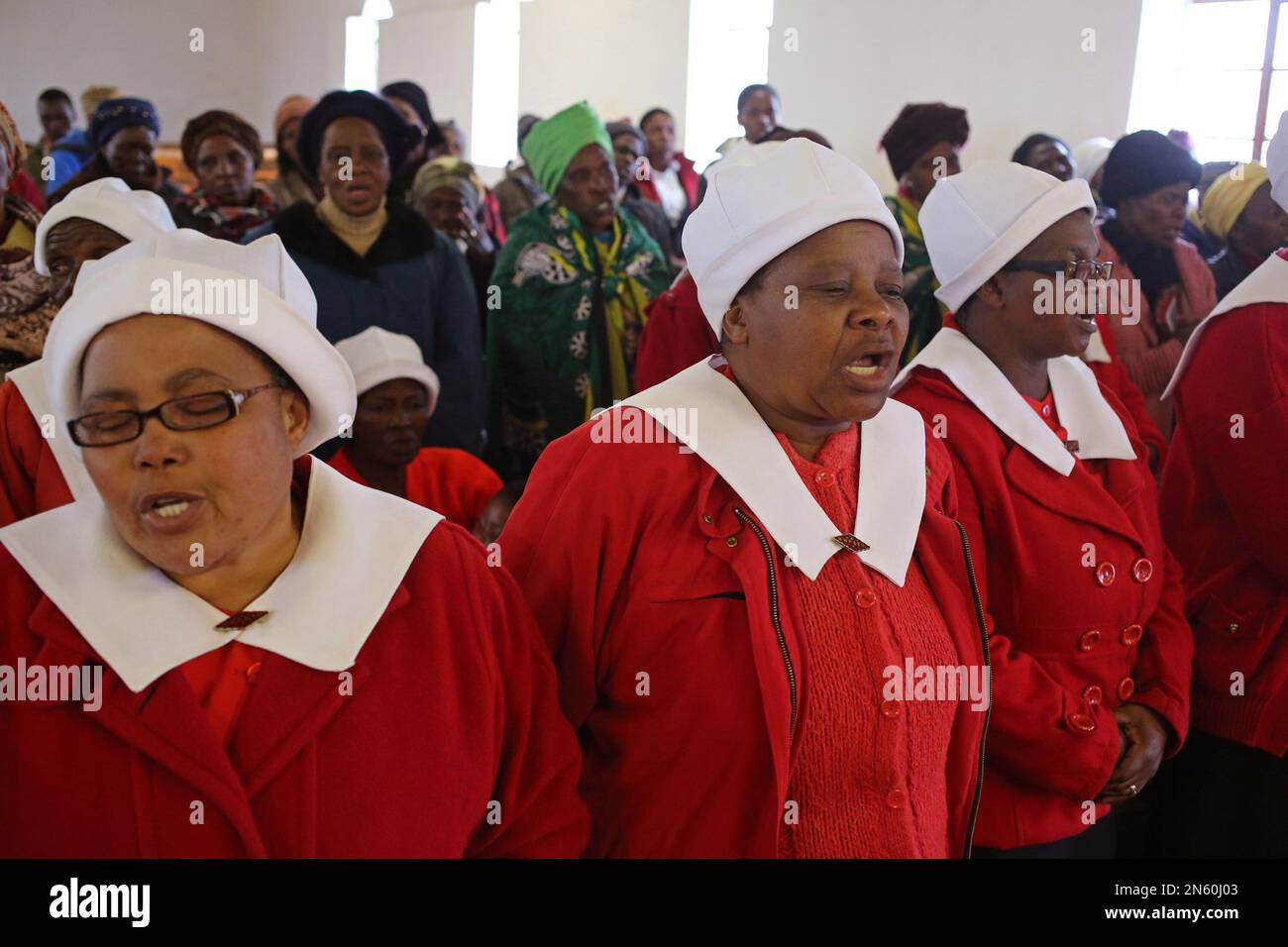 People pray for former South African president Nelson Mandela, inside ...