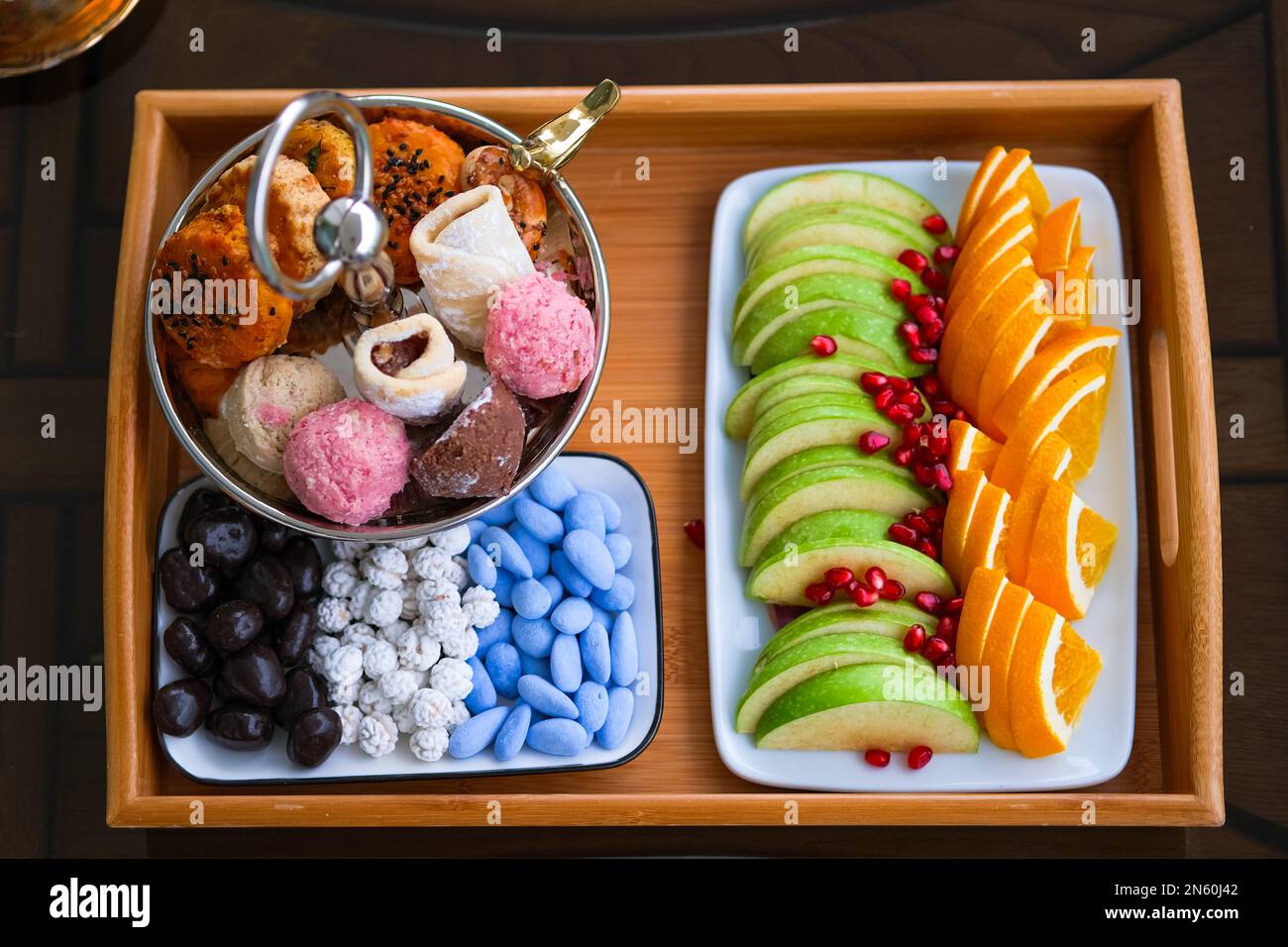 Tray of sweets and fruit served for tea Stock Photo - Alamy