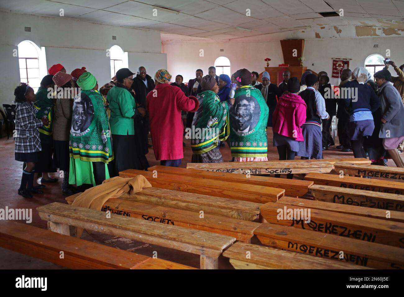 People sing and dance as they celebrate the life of former South ...