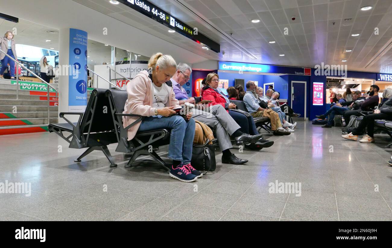 Passengers sitting in flight hi-res stock photography and images - Alamy