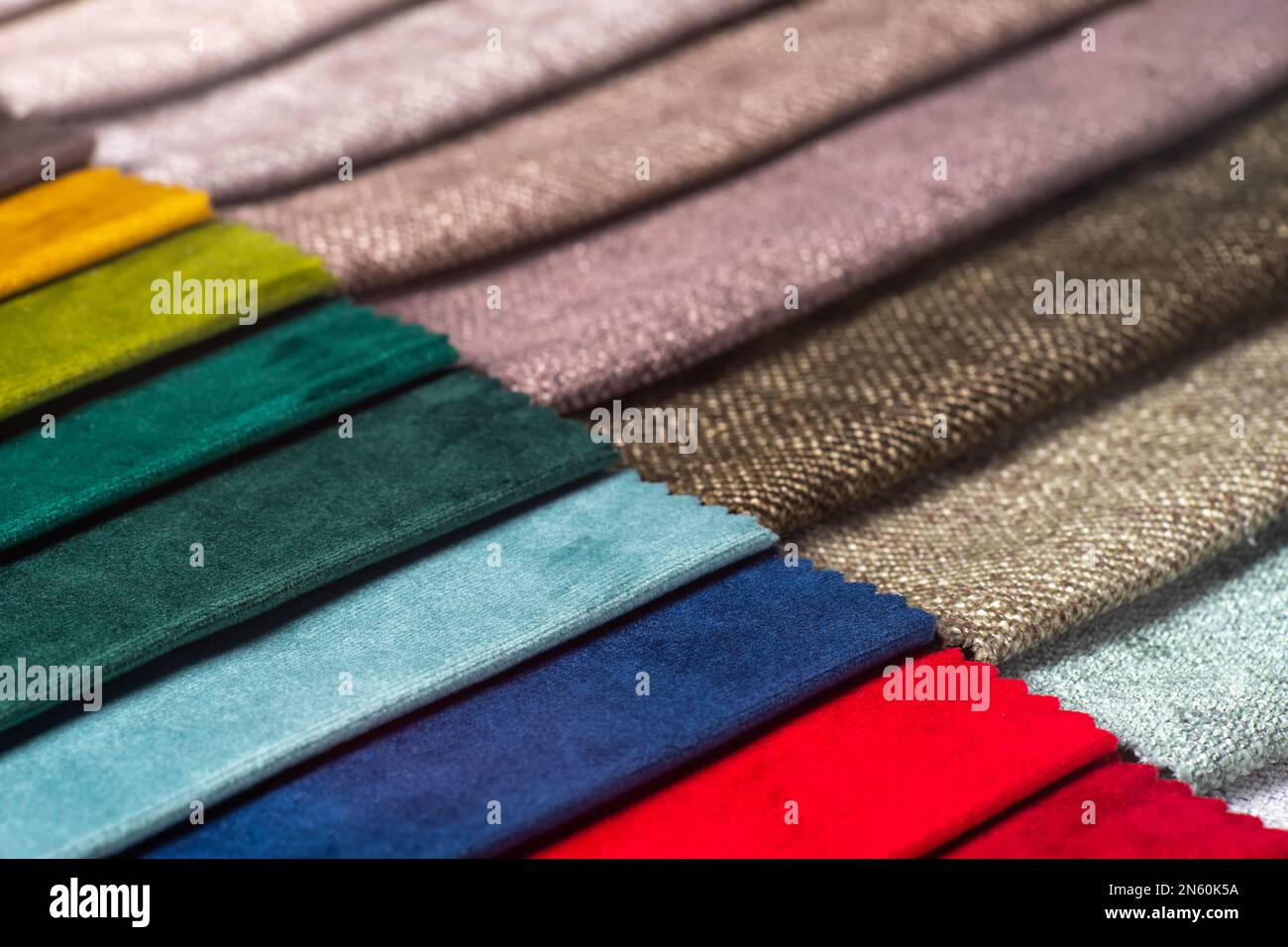 Bright collection of colorful textile samples. Fabric swatches, set in ...