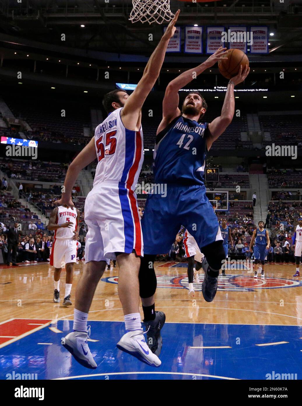 Minnesota Timberwolves power forward Kevin Love (42) drives on Detroit ...