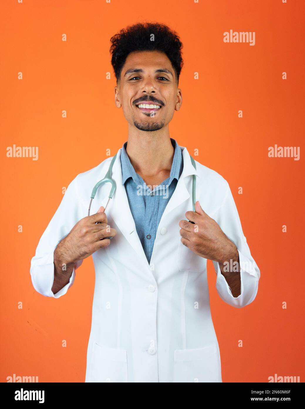 Black Brazilian Doctor Medical Resident With Stethoscope on Orange ...