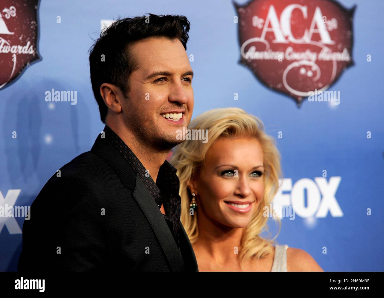 Luke Bryan, left, and Caroline Bryan arrive at the American Country ...