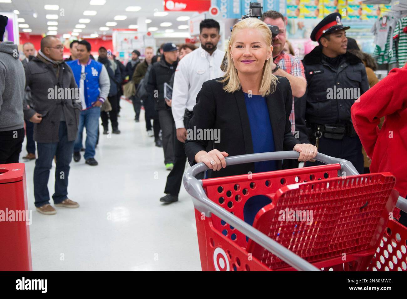 Elisha Cuthbert tours the Shoppers World Danforth Target store location ...