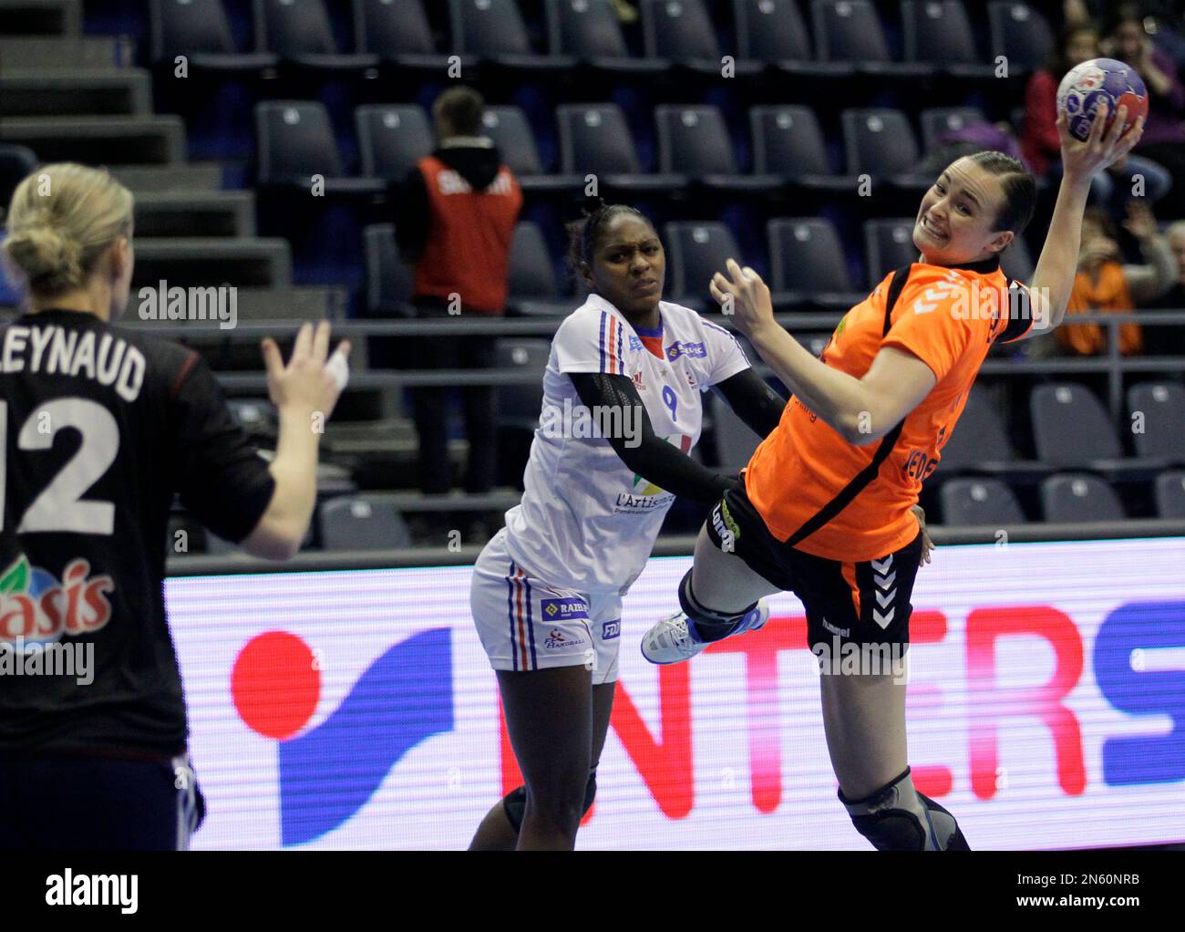 Dutch Yvette Broch, right tries to score as France's Paule Baudouin ...