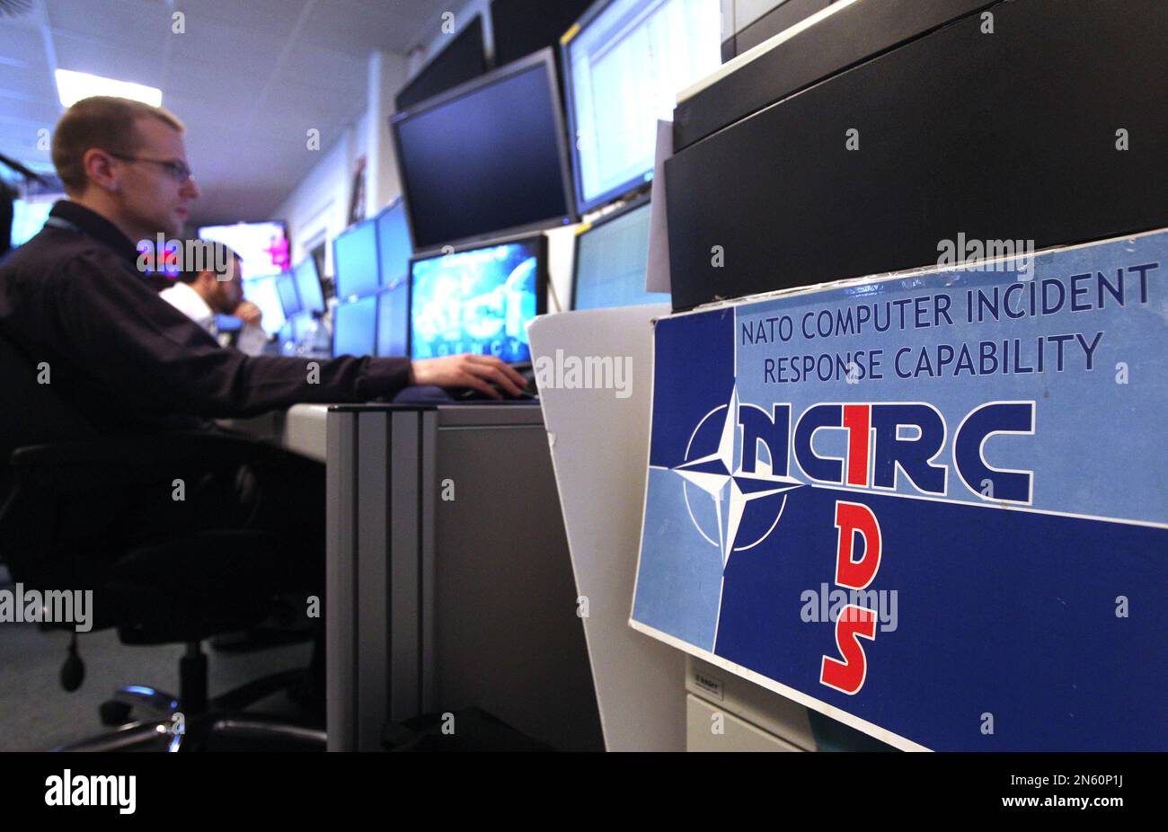 A computer expert operates at the NATO Computer Incident Response ...