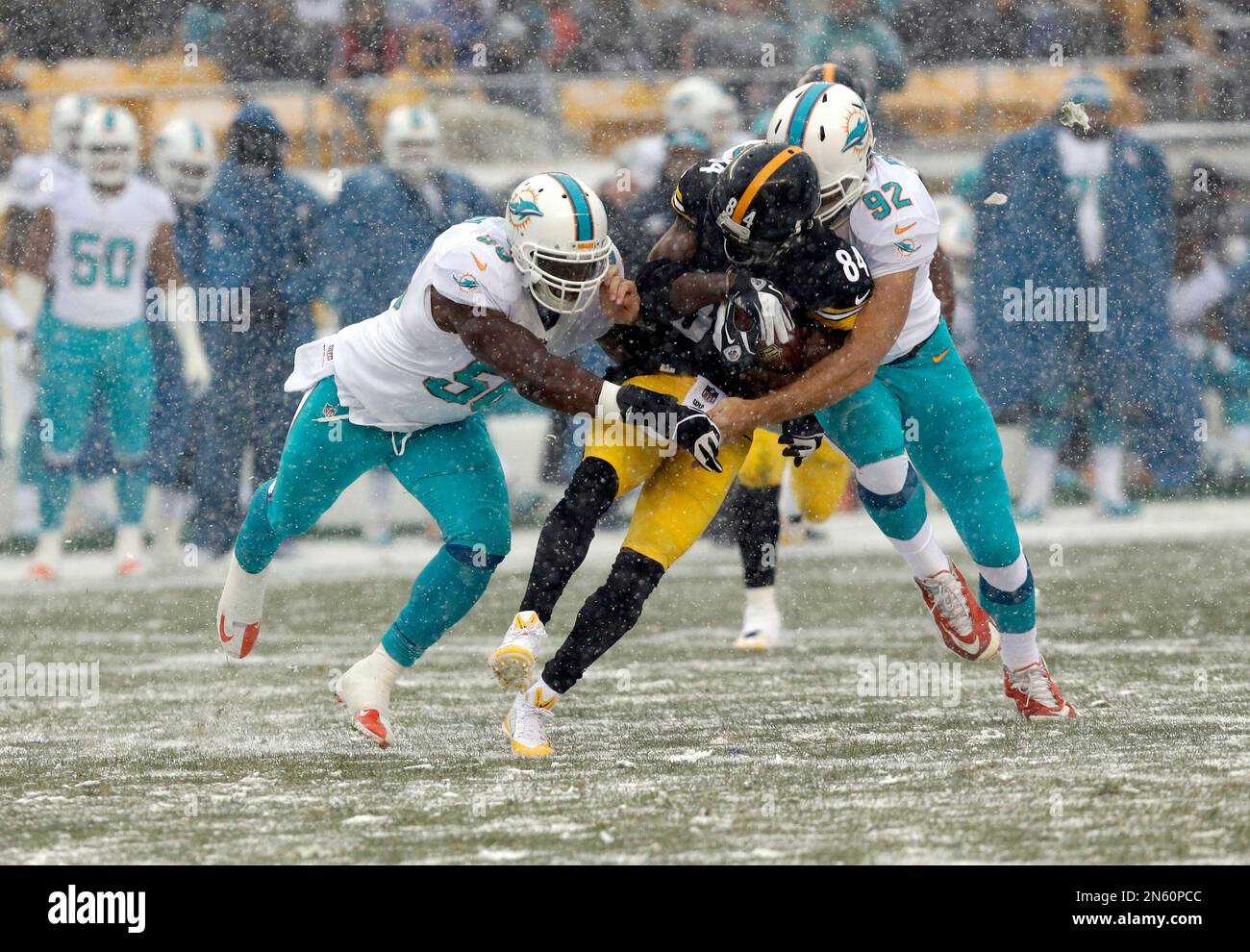 Pittsburgh Steelers Antonio Brown (84) is tackled by Miami Dolphins ...