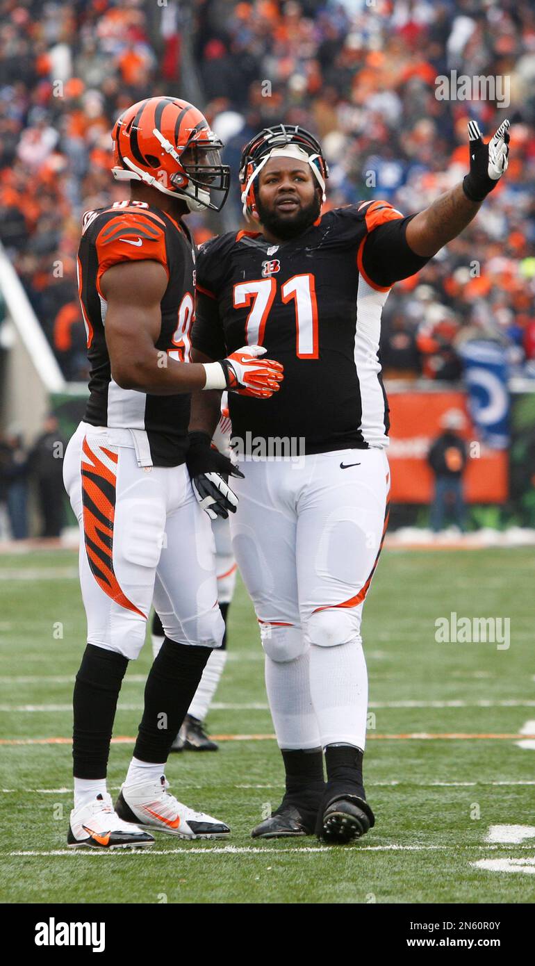 Cincinnati Bengals tackle Andre Smith (71) talks with Michael Johnson ...