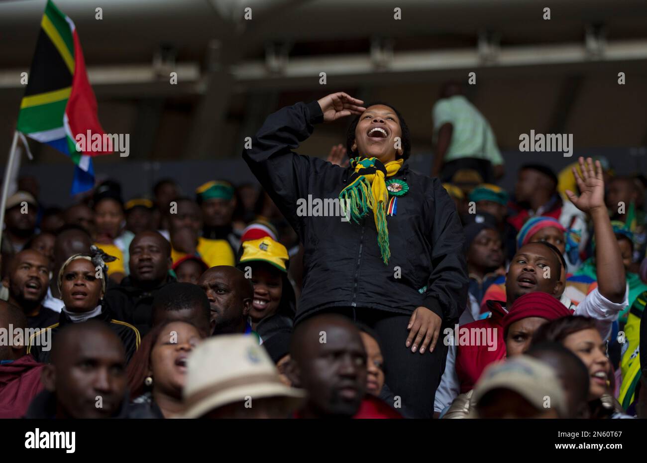 A woman sings during the memorial service for former South African ...