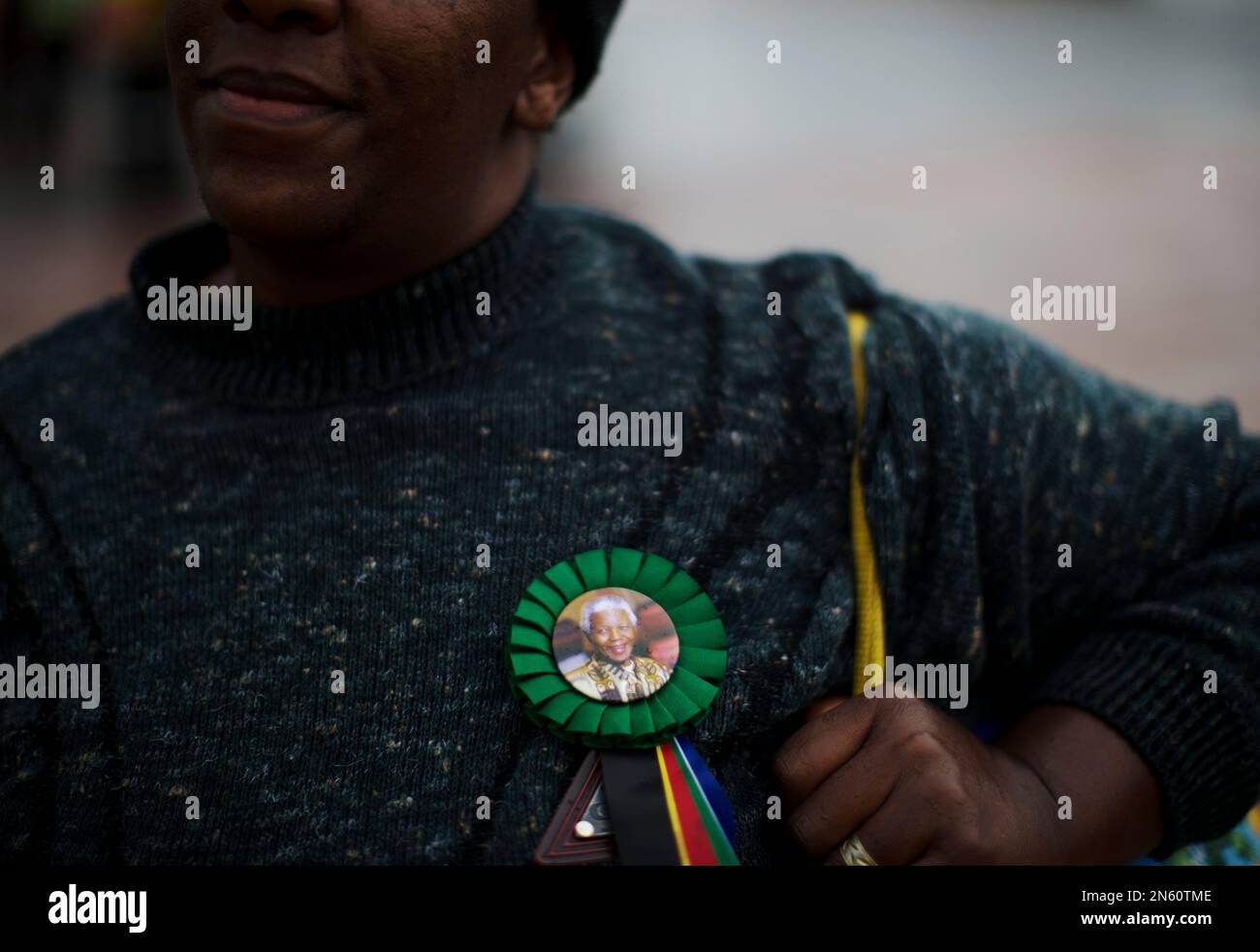A mourner arrives for the memorial service for former South African ...