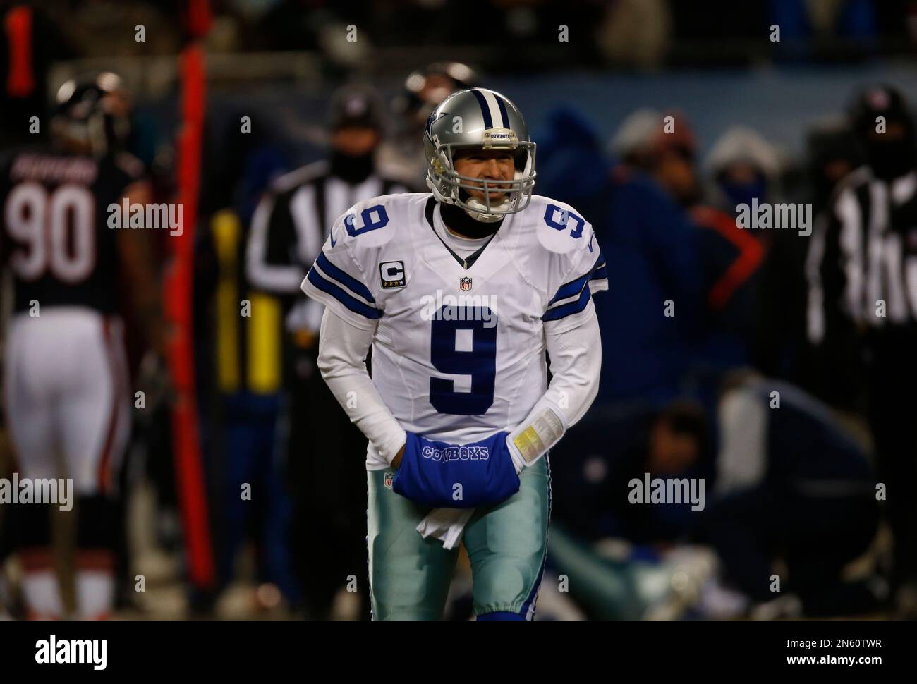 Dallas Cowboys quarterback Tony Romo (9) looks to the sidelines during ...