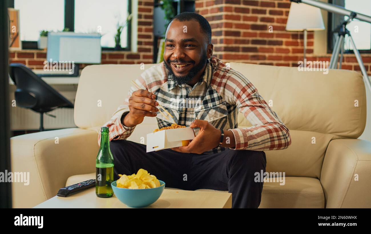 Binge watching asian hi-res stock photography and images - Alamy