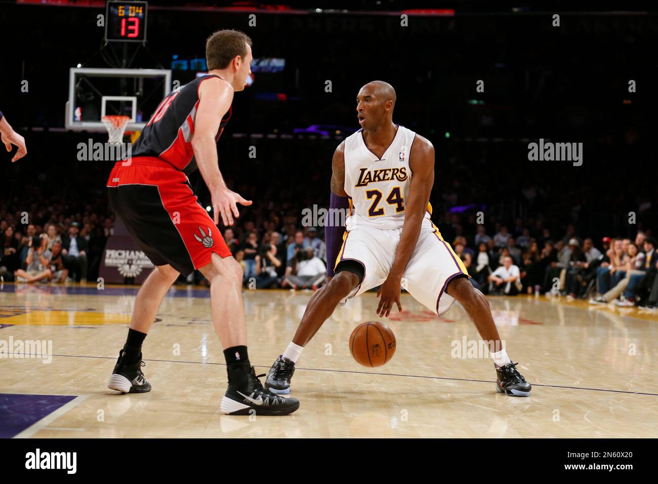 Los Angeles Lakers' Kobe Bryant dribbles the ball between his legs as ...