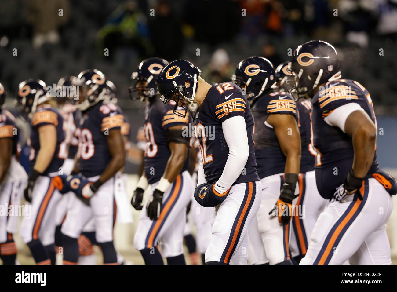Chicago Bears quarterback Josh McCown (12) and teammates walk on the ...