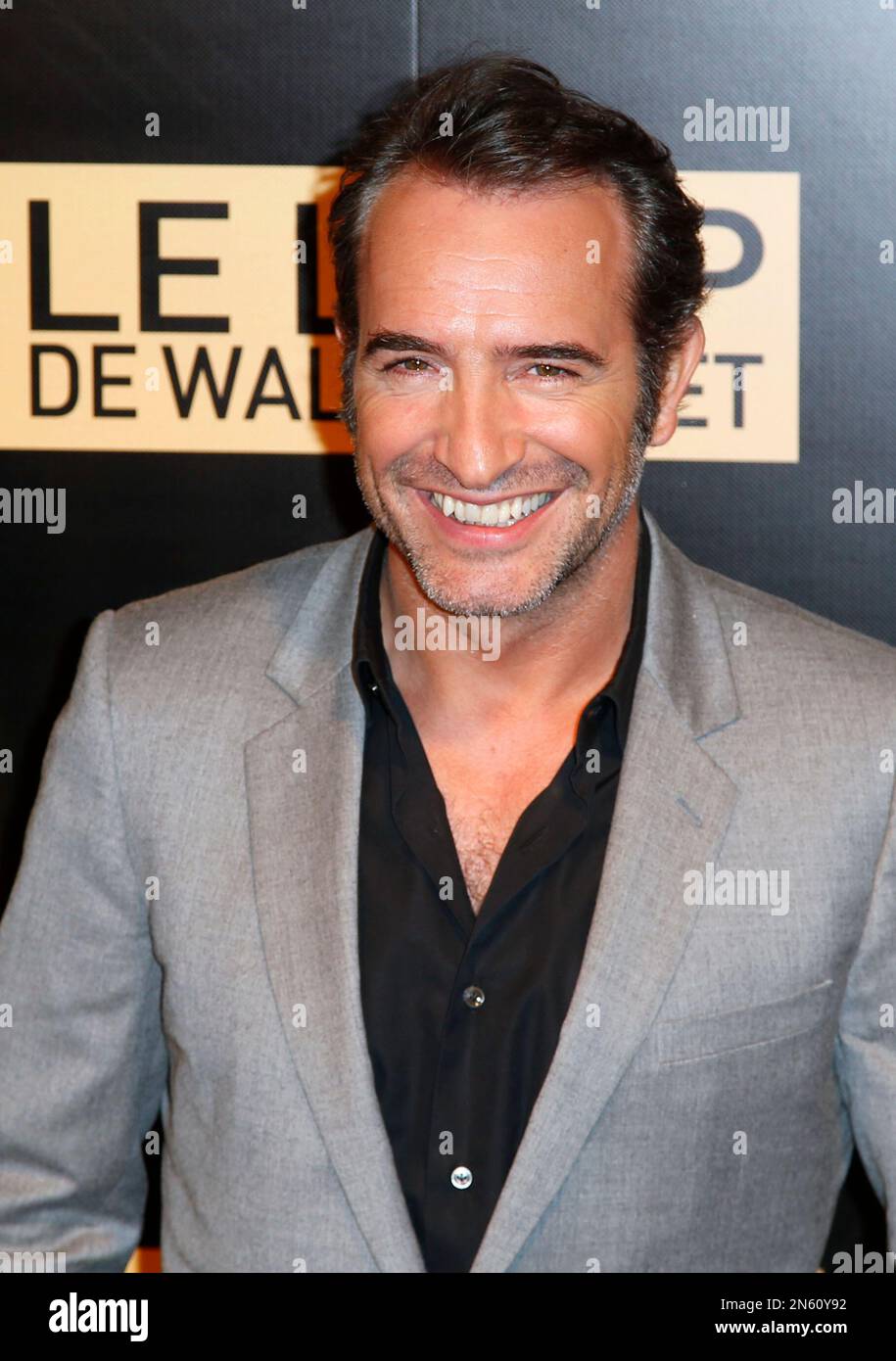 French actor Jean Dujardin arrives for the screening of The Wolf of ...