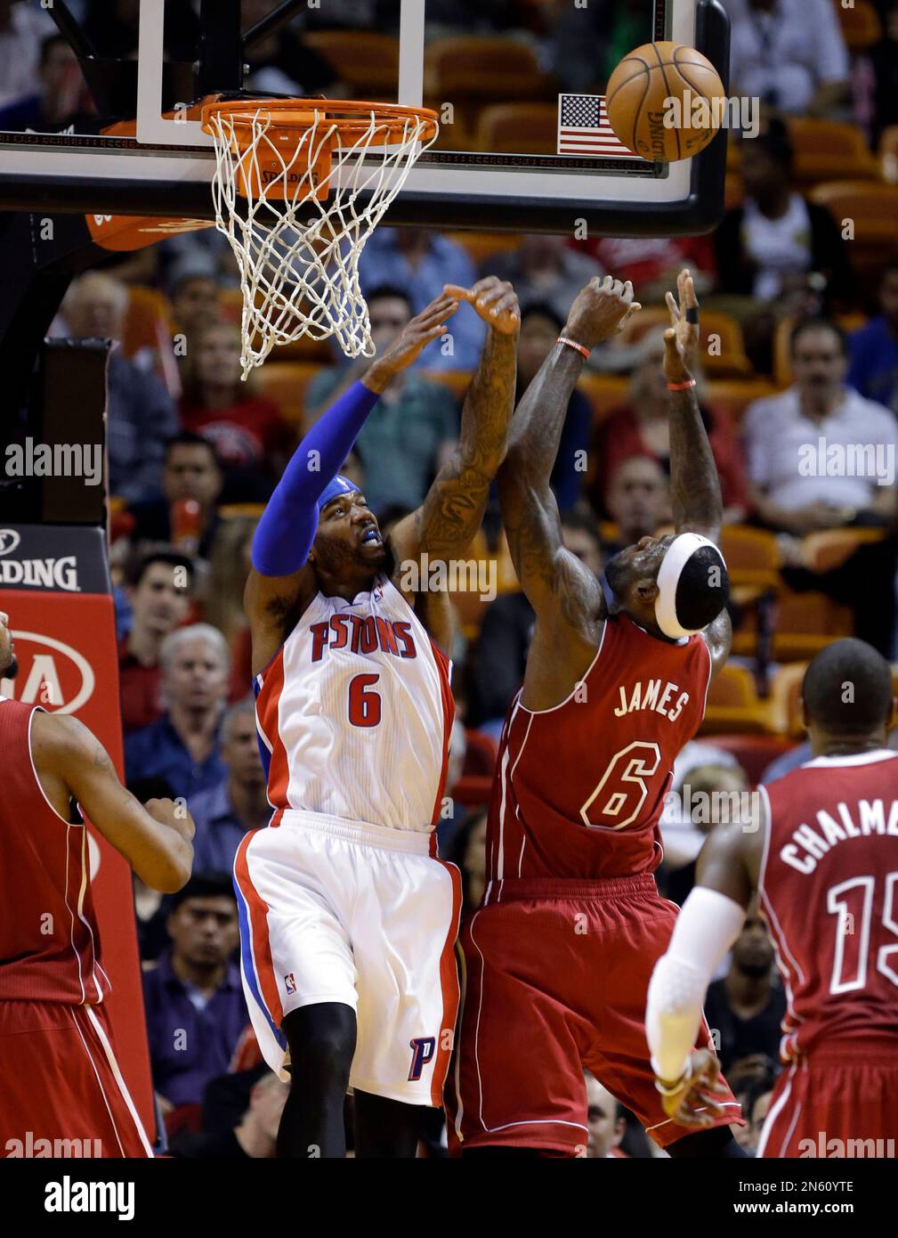 Miami Heat's LeBron James (6) is called with a loose ball foul as he ...