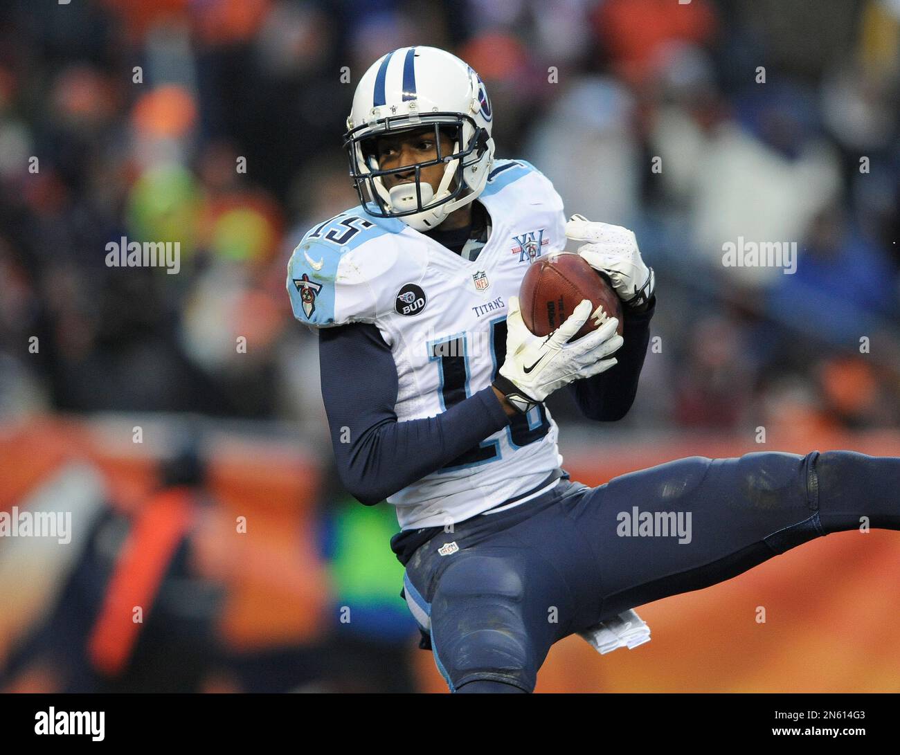 Tennessee Titans wide receiver Justin Hunter hails in a touchdown past ...
