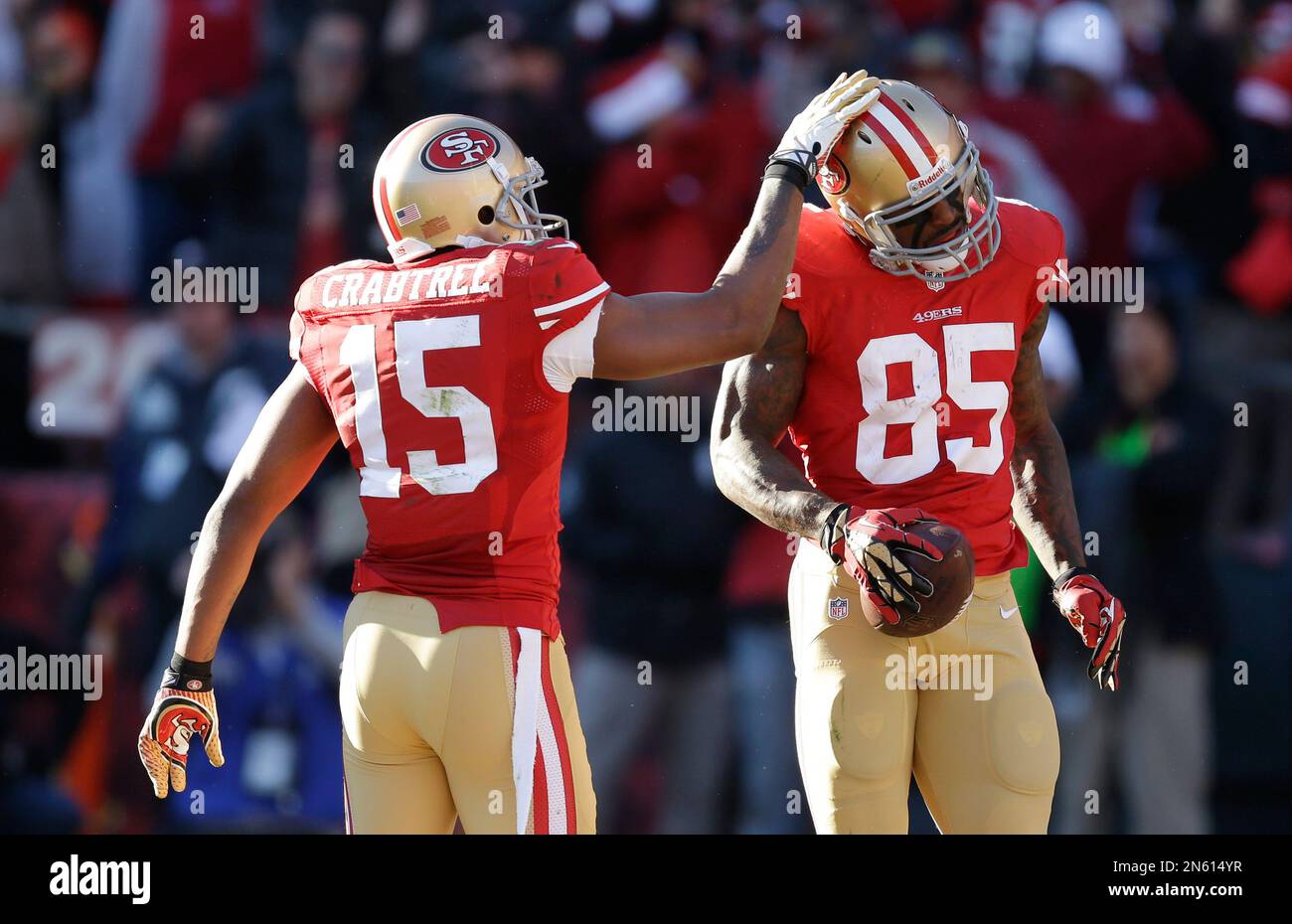 San Francisco 49ers tight end Vernon Davis (85) is greeted by 49ers ...