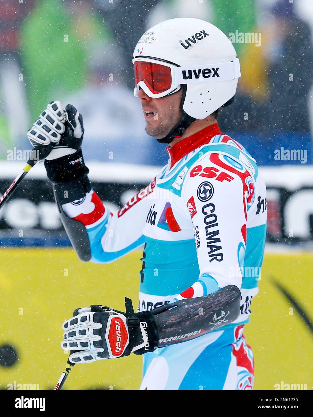 France's Thomas Fanara holds up his fist after finishing his first run ...