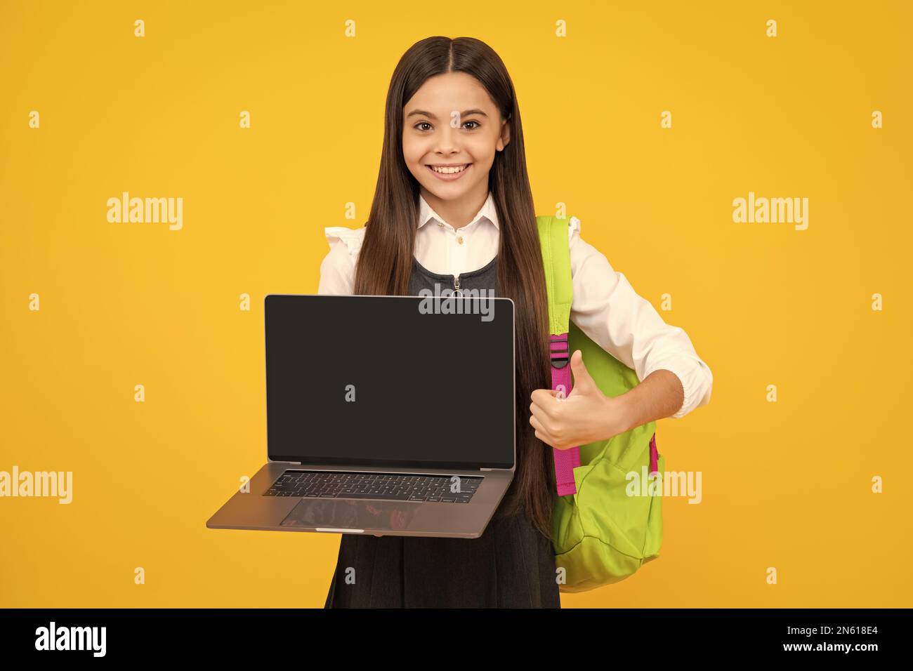 Back to school, Teenager school girl with laptop computer. Happy girl ...