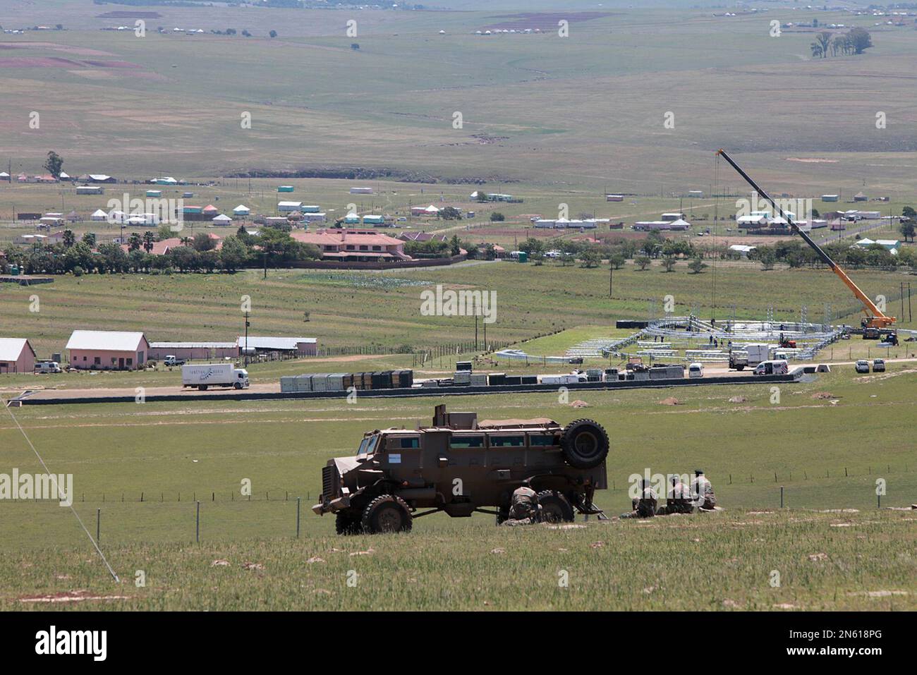 South African soldiers park their APC overlooking the area under ...