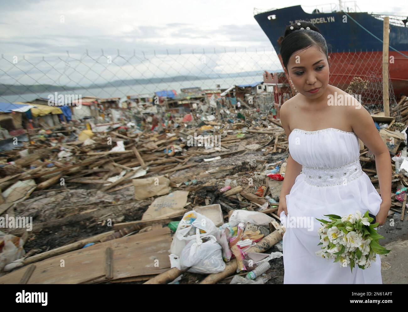 In this photo taken on Saturday, Dec. 7, 2013, Filipino bride Riza ...