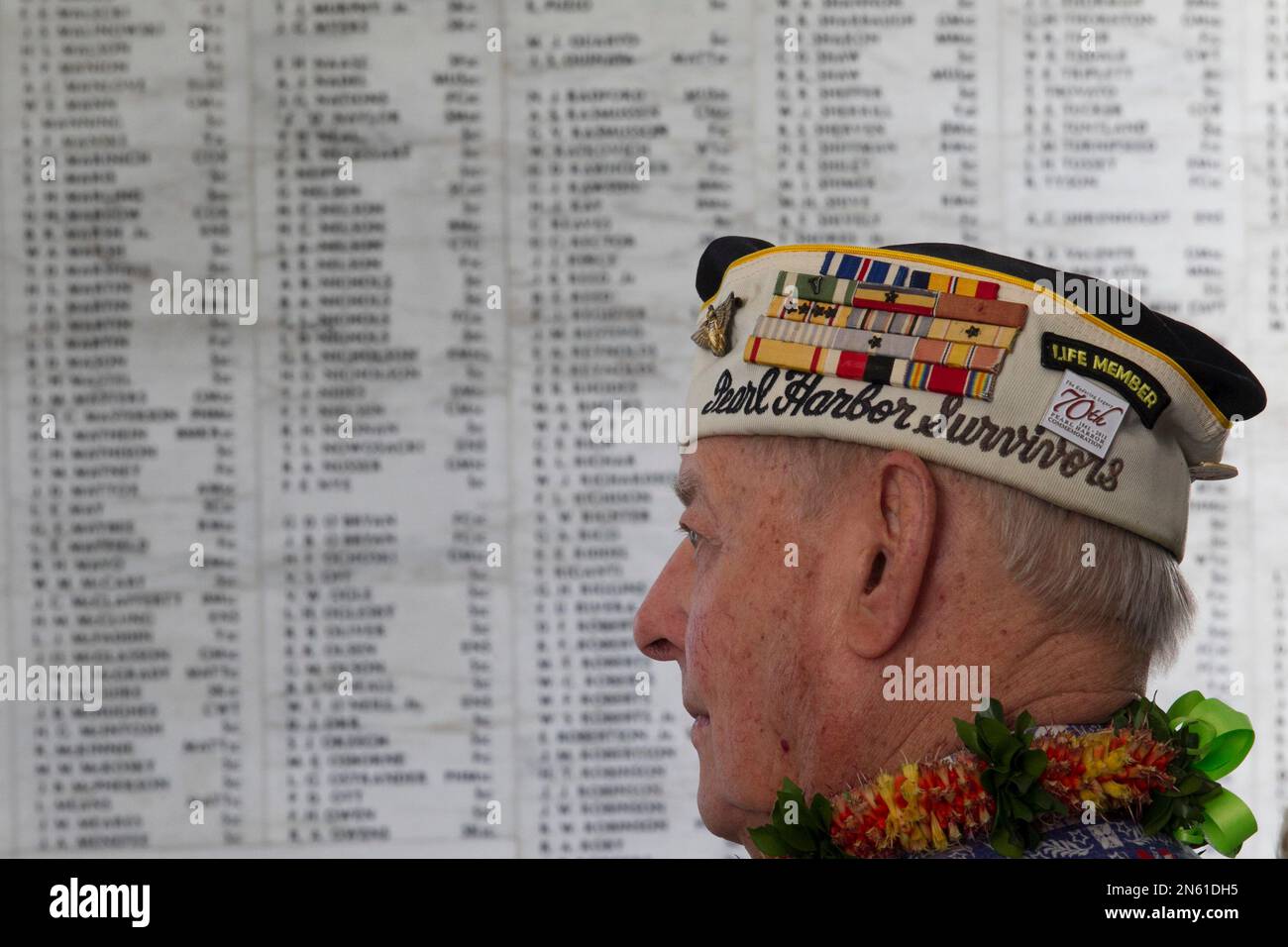 Pearl Harbor survivor Lou Contor stands in the memorial room aboard the ...