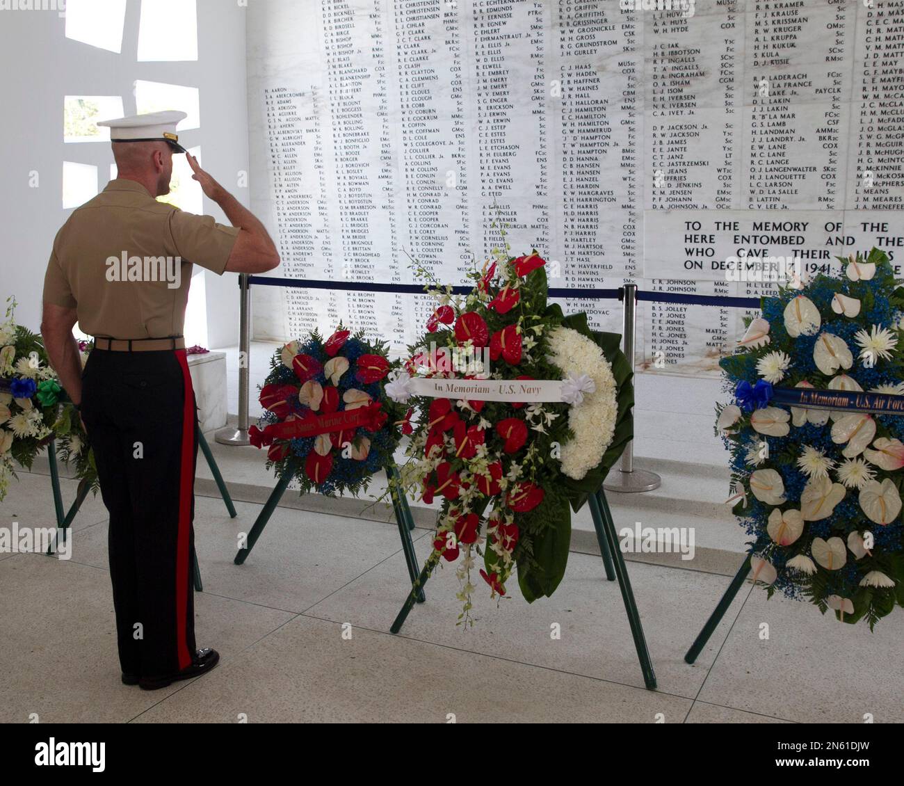 US Marines Brig Gen Richard Simcock salutes a flower wreath in the ...