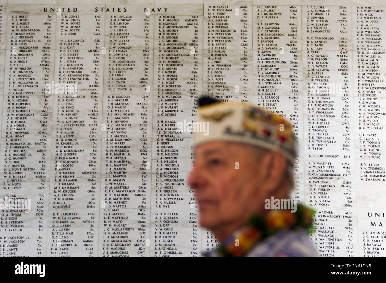 Pearl Harbor survivor Lou Contor stands in the memorial room aboard the ...