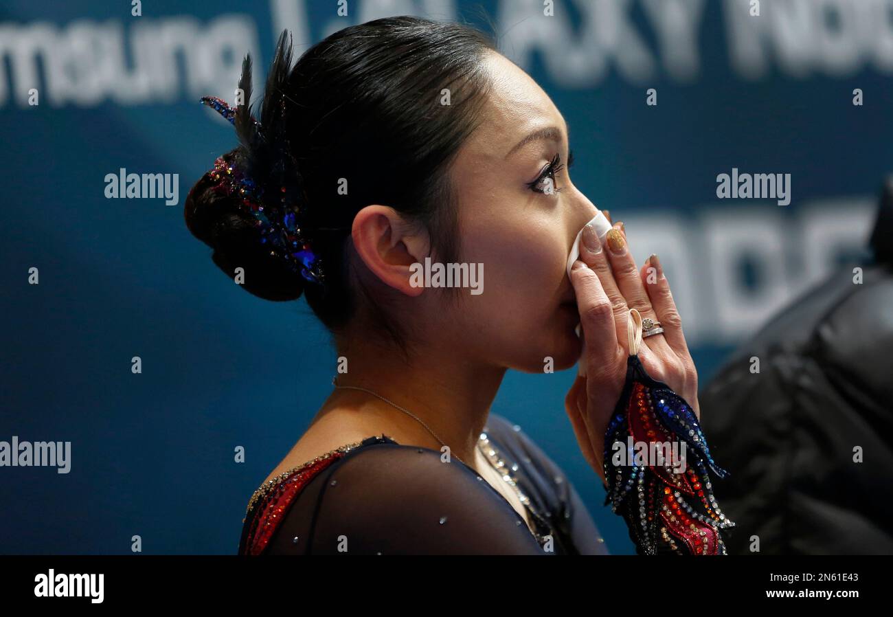 Japan's Miki Ando reacts after seeing results, placing her second, in ...
