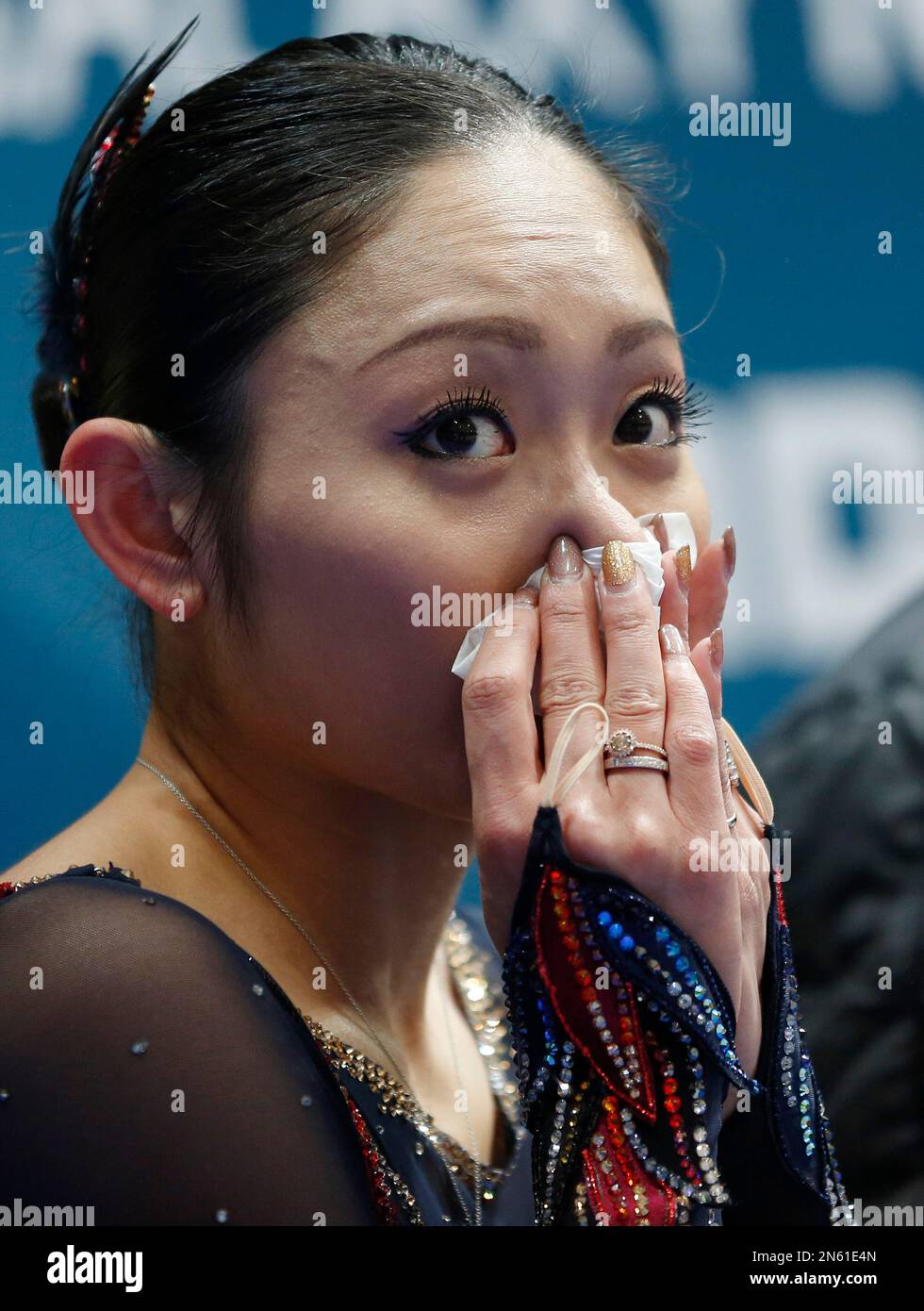 Japan's Miki Ando reacts after seeing results, placing her second, in ...