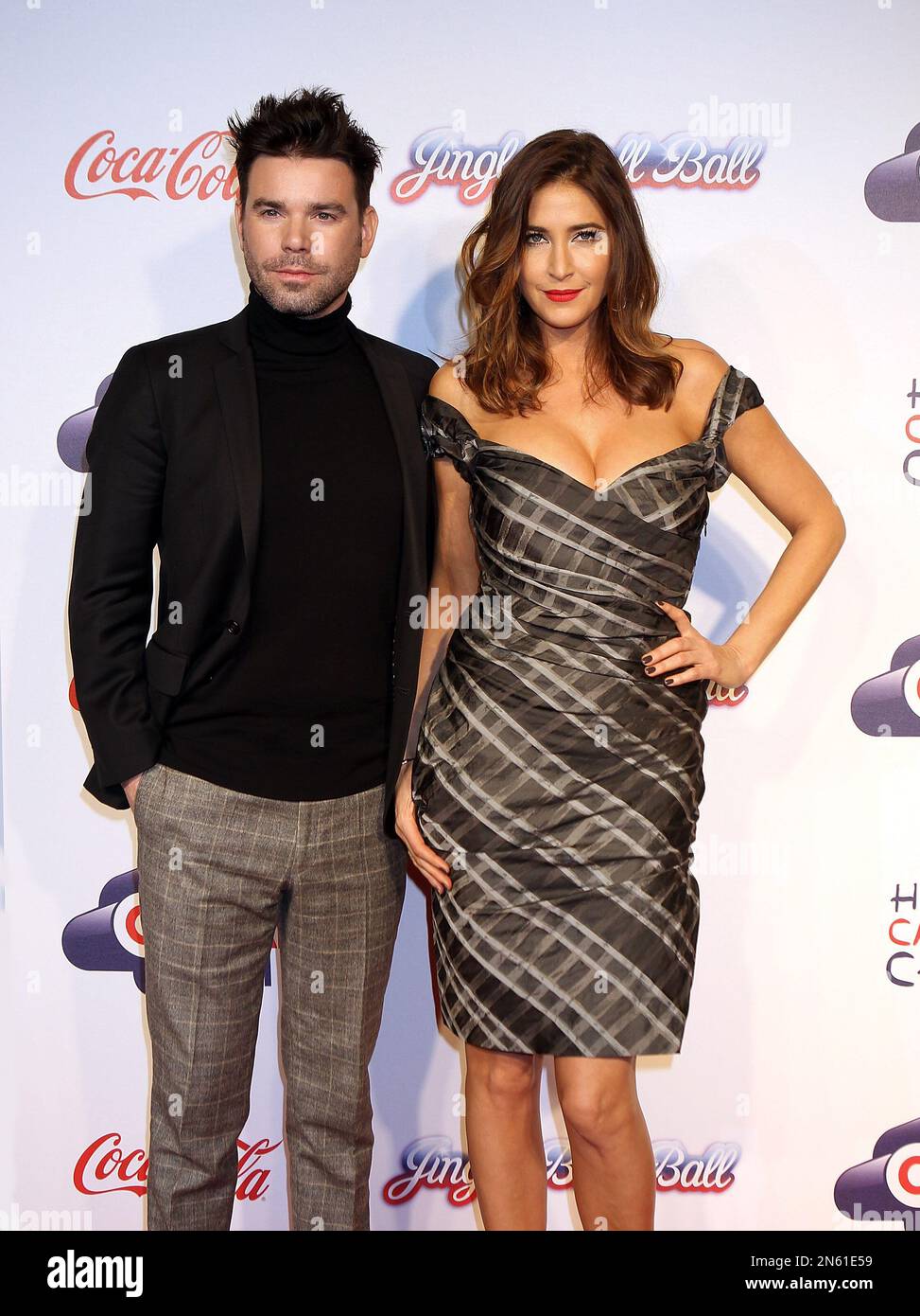 British presenters Dave Berry and Lisa Snowdon pose backstage at ...