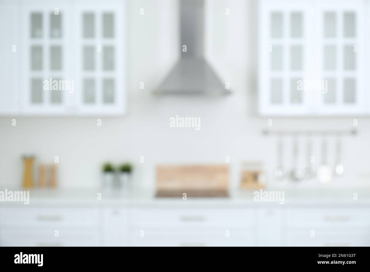 Blurred view of modern stylish kitchen interior Stock Photo - Alamy
