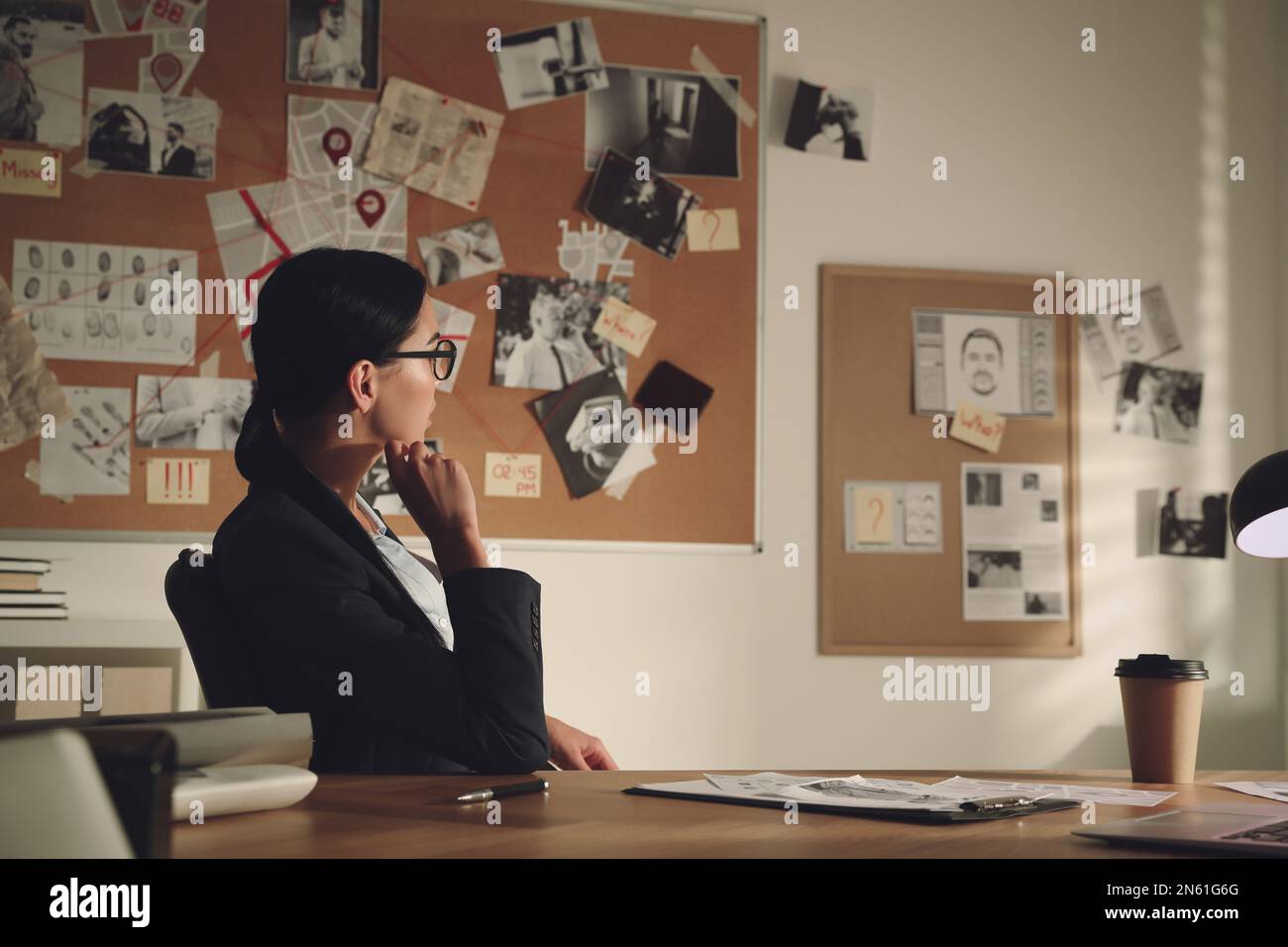 Young police woman desk hi-res stock photography and images - Alamy