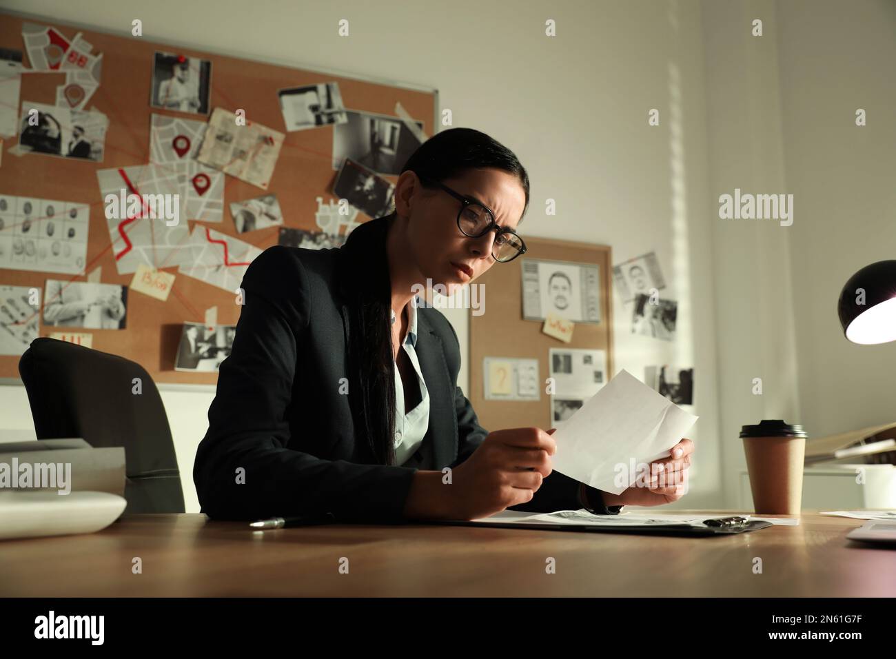 Young police woman desk hi-res stock photography and images - Alamy